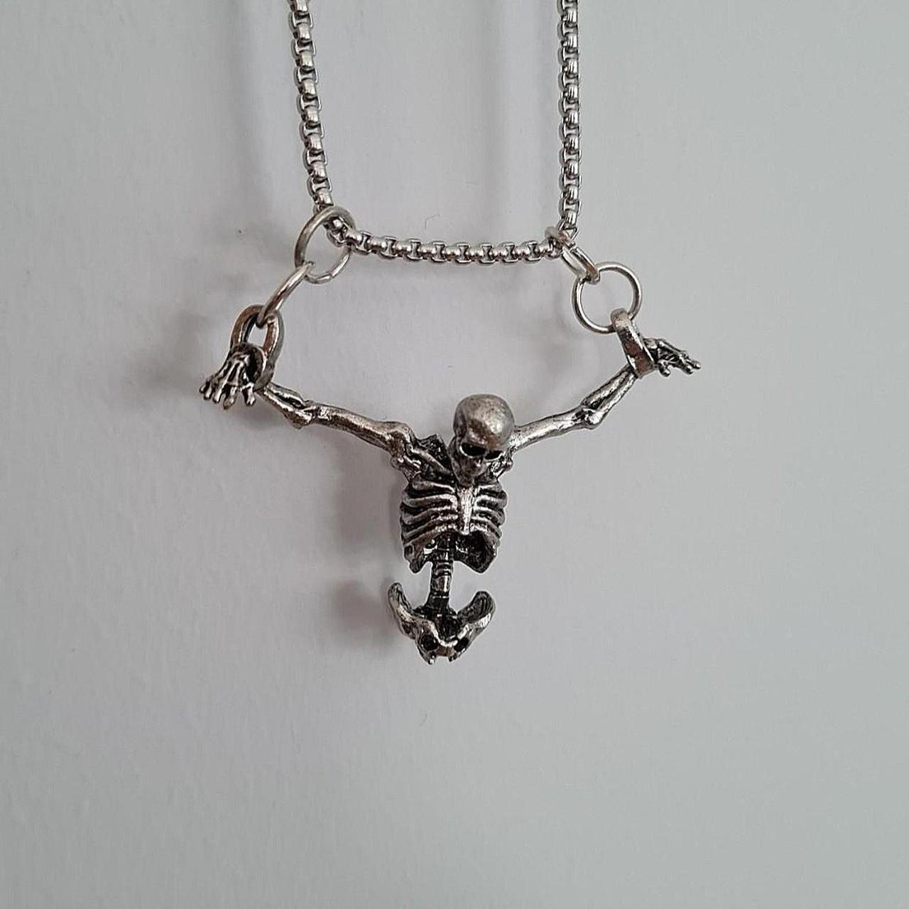 Chained skeleton necklace Unusual design and great... - Depop