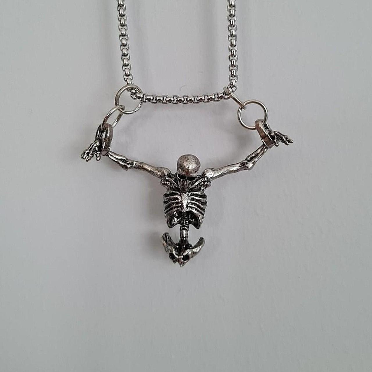Chained skeleton necklace Unusual design and great... - Depop