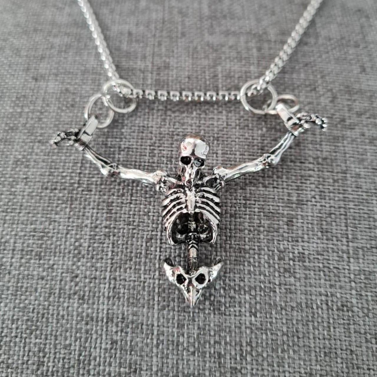 Chained skeleton necklace Unusual design and great... - Depop