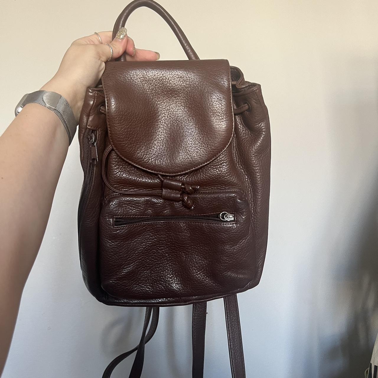 Brown leather mini back pack Fits a book and basic... - Depop