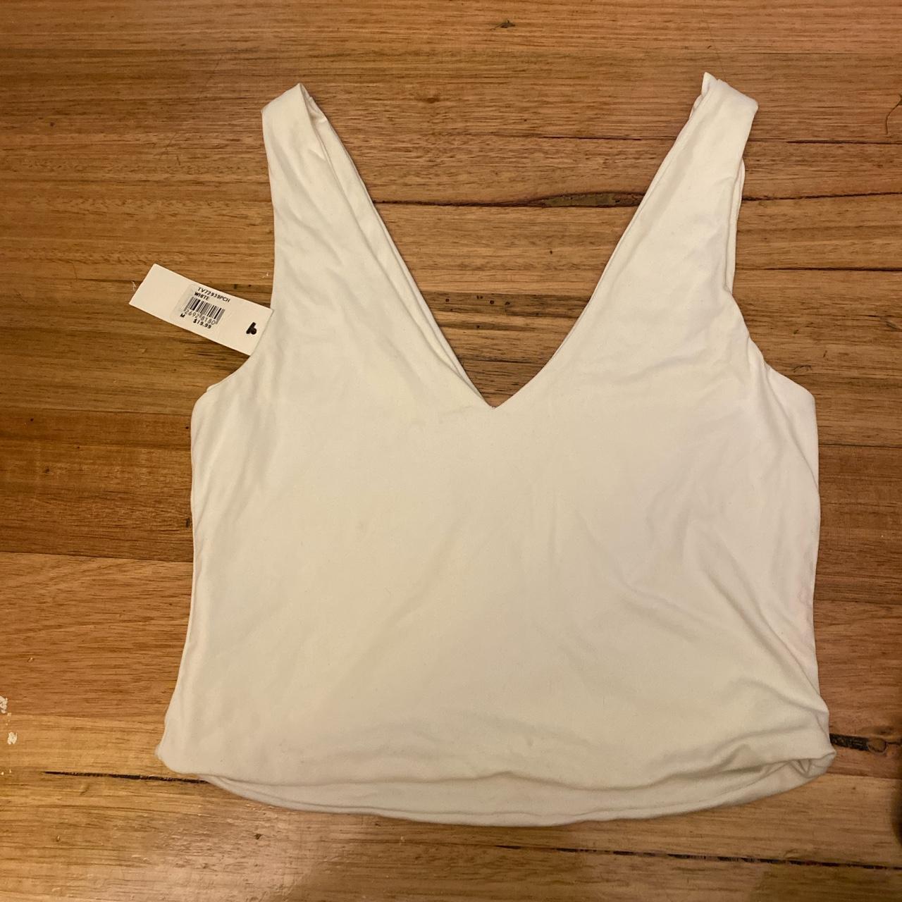 White Glassons V neck singlet new with tag size M... - Depop