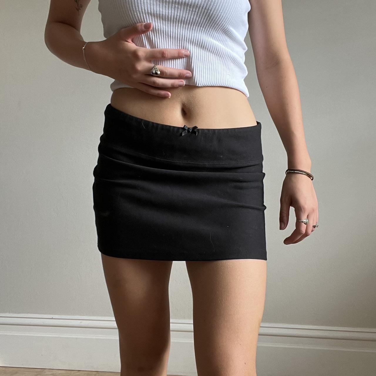 Basic black micro skirt with cute bow on the front... - Depop