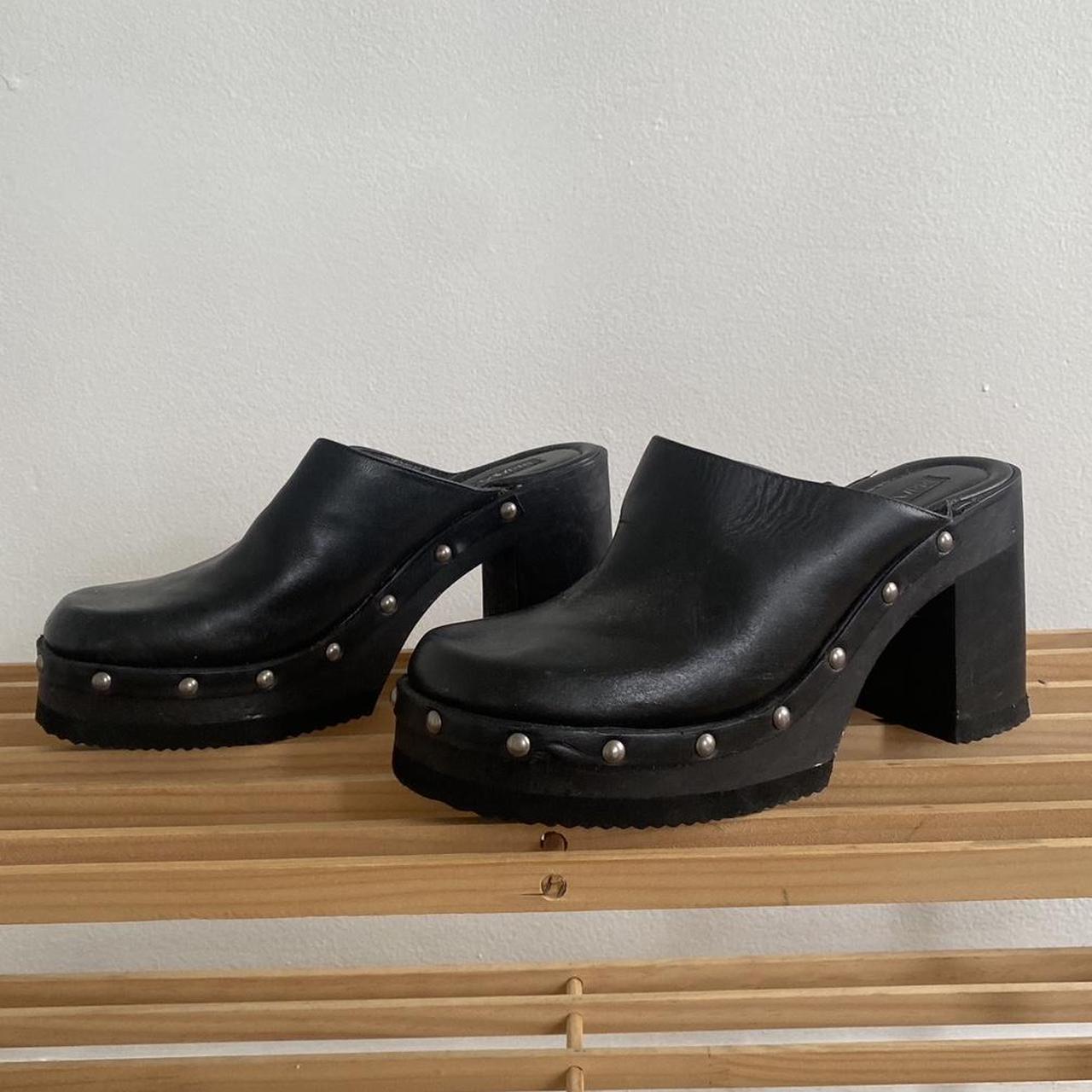 Black leather platform clogs with studded details.... - Depop