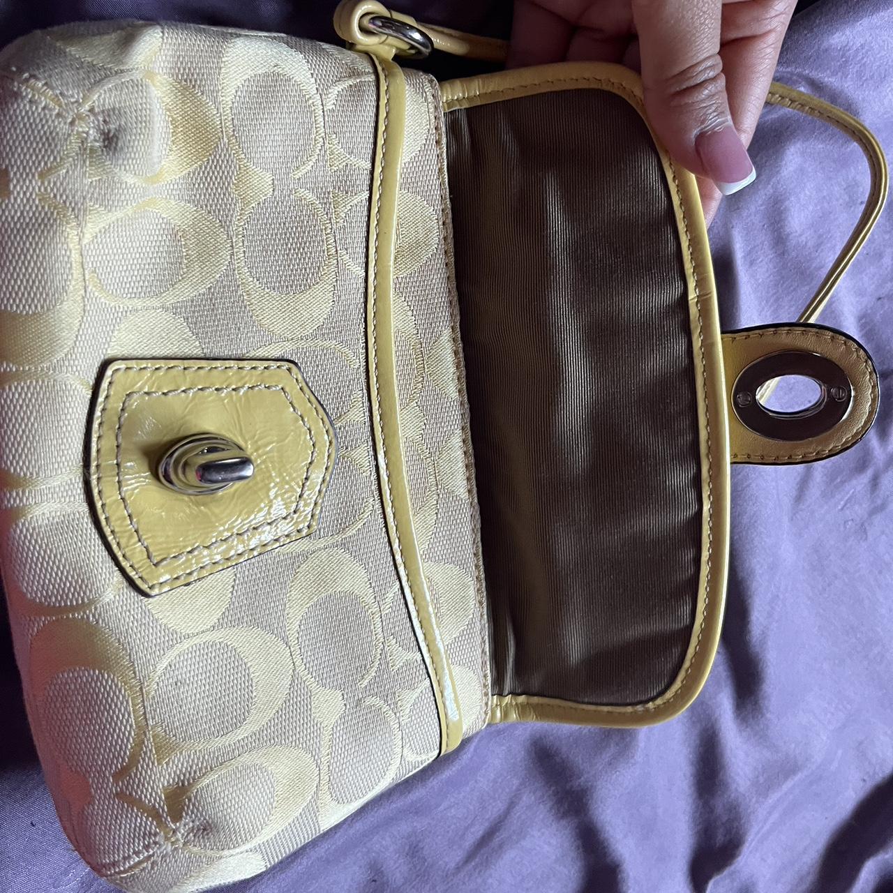 Really cute vintage yellow coach wristlet - Depop