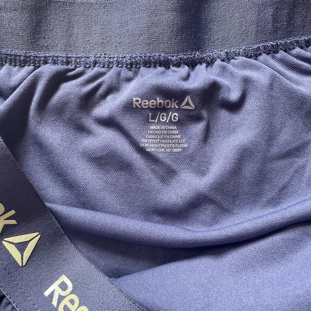 Reebok Women's Blue and Cream Shorts | Depop