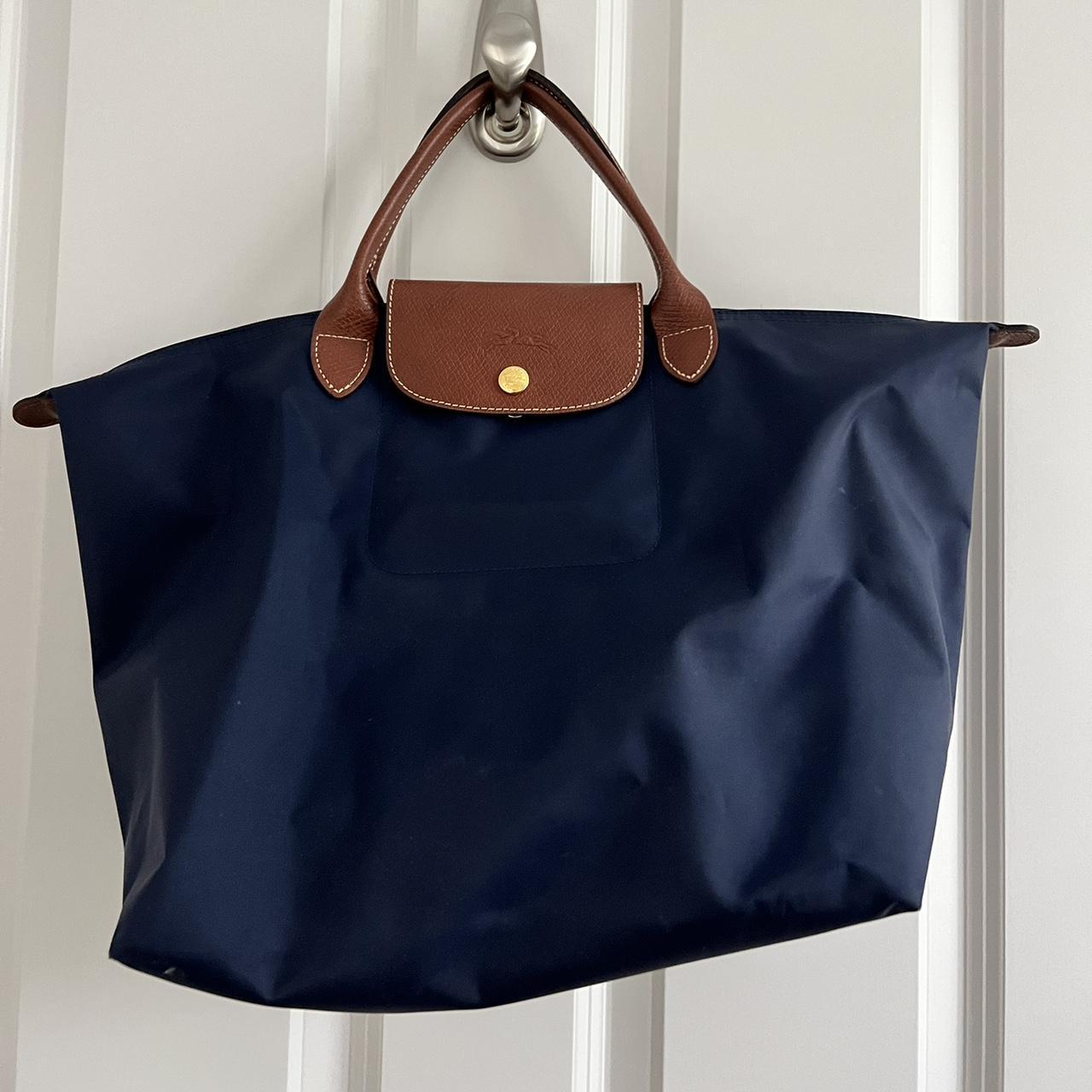 Longchamp le pliage tote. Navy with brown handles.... - Depop