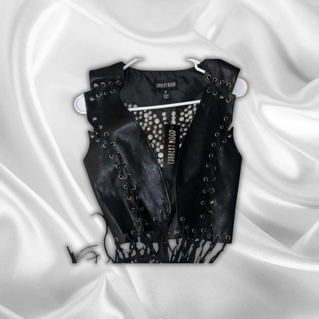 Faux leather rock vest with butterfly embellishments - Depop