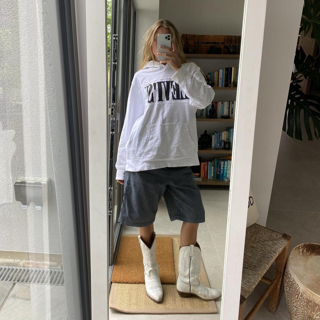 unisex White oversized Levi’s hoodie. This jumper is... - Depop