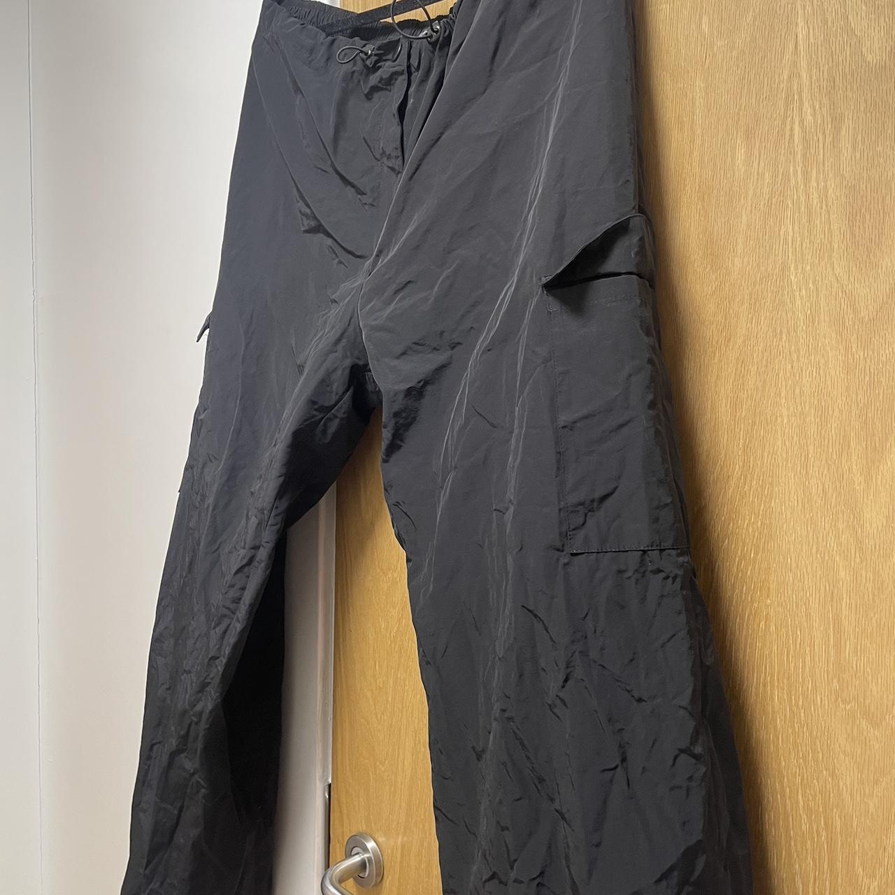 black cargos with draw strings at bottom of leg,... - Depop