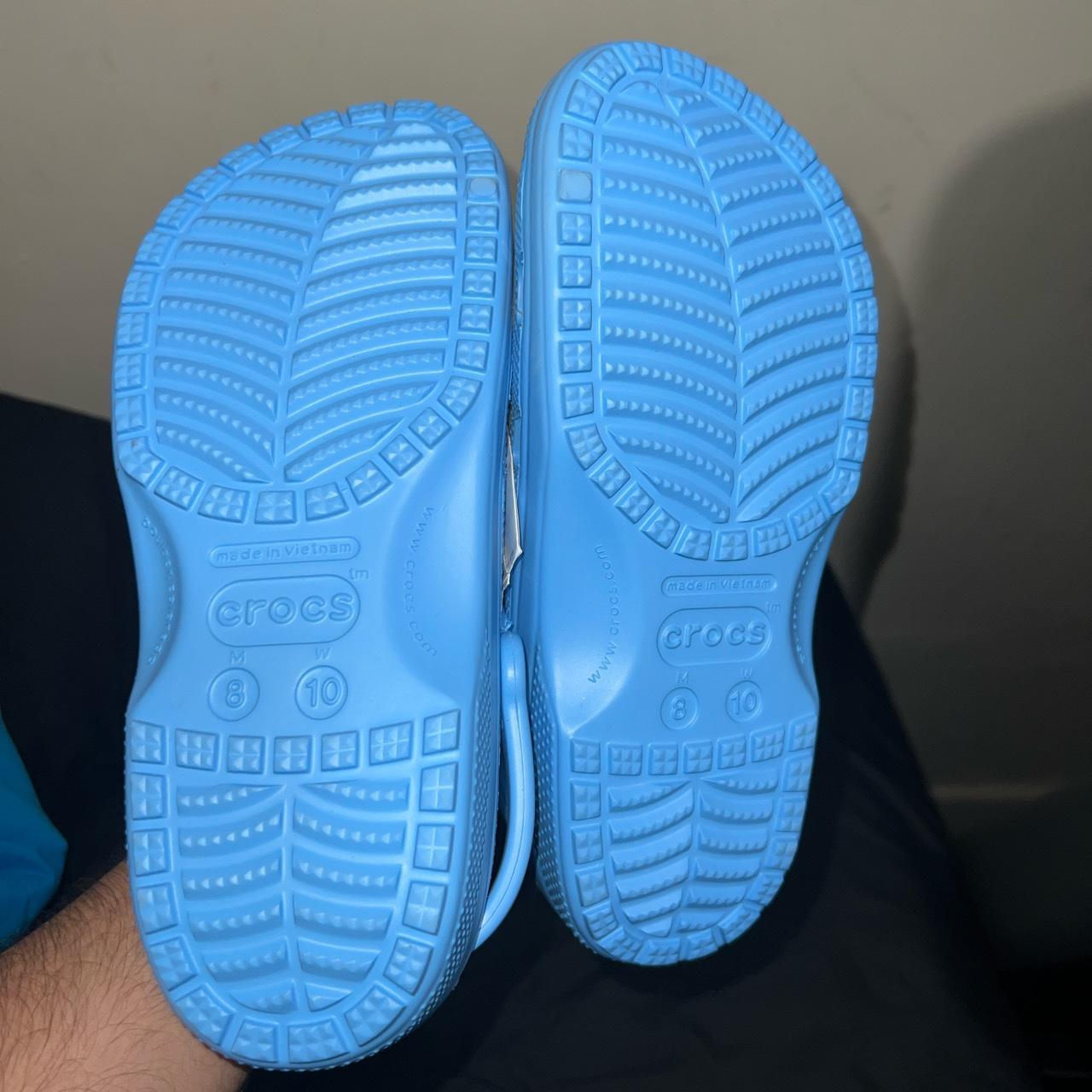 Men’s light blue crocs size 8m or 10w, never worn... - Depop