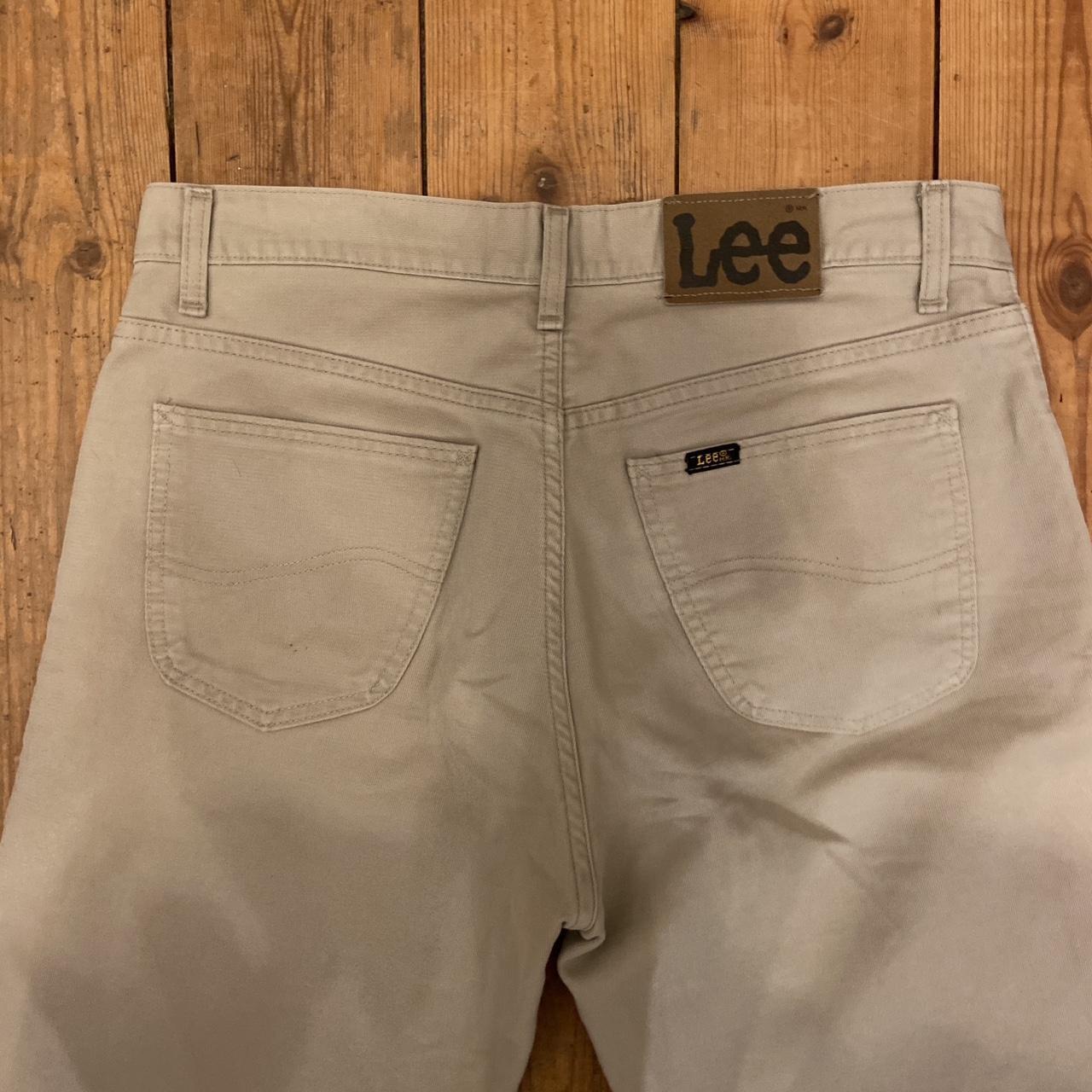 Vintage Lee jeans in beige. Nice wide straight leg... - Depop