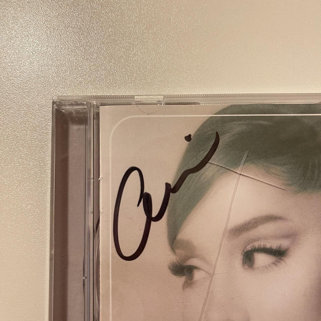 Ariana Grande signed Positions CD! Does have a few... - Depop