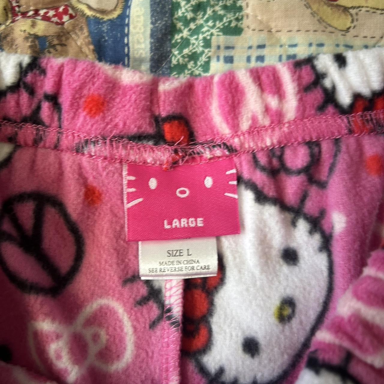 Pink hello kitty pj pants in a size kids large brand... - Depop