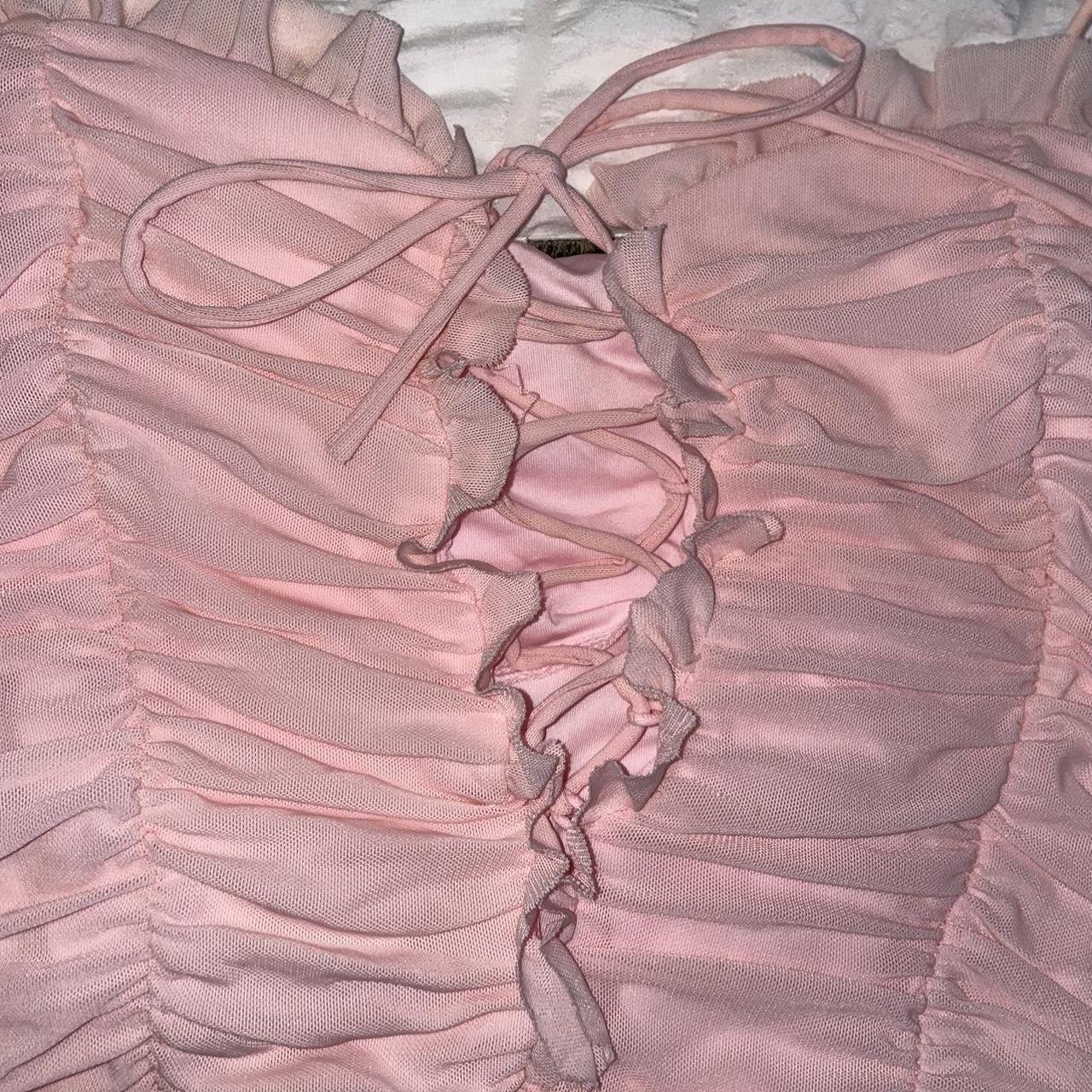 Pink lace up body suit. Super flattering and cute.... - Depop