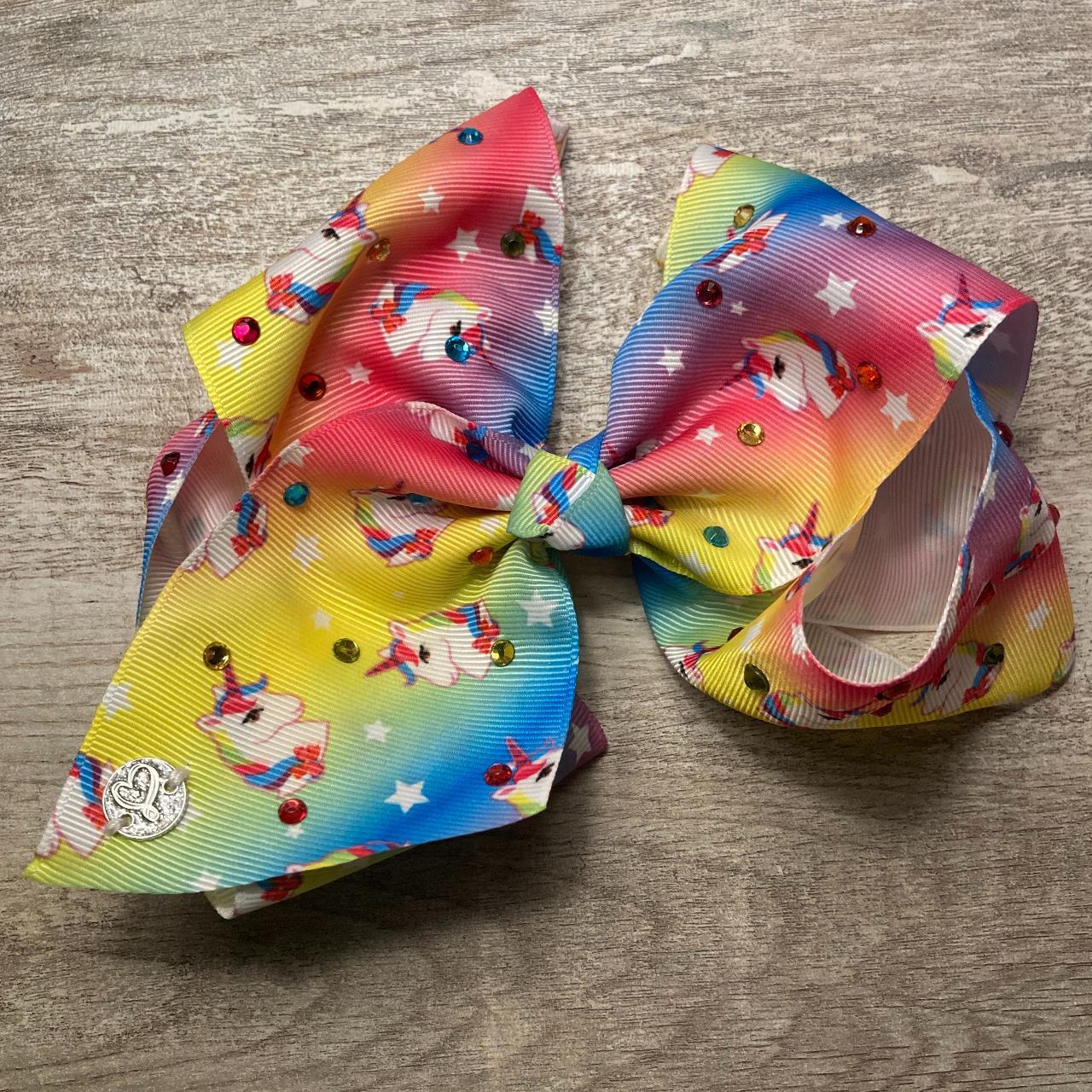 Unicorn rainbow JoJo Siwa bow with stars. Worn once... - Depop