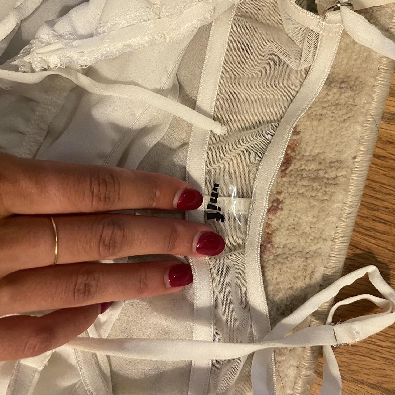 Unif angel tank Super cute but small dot on the mesh... - Depop