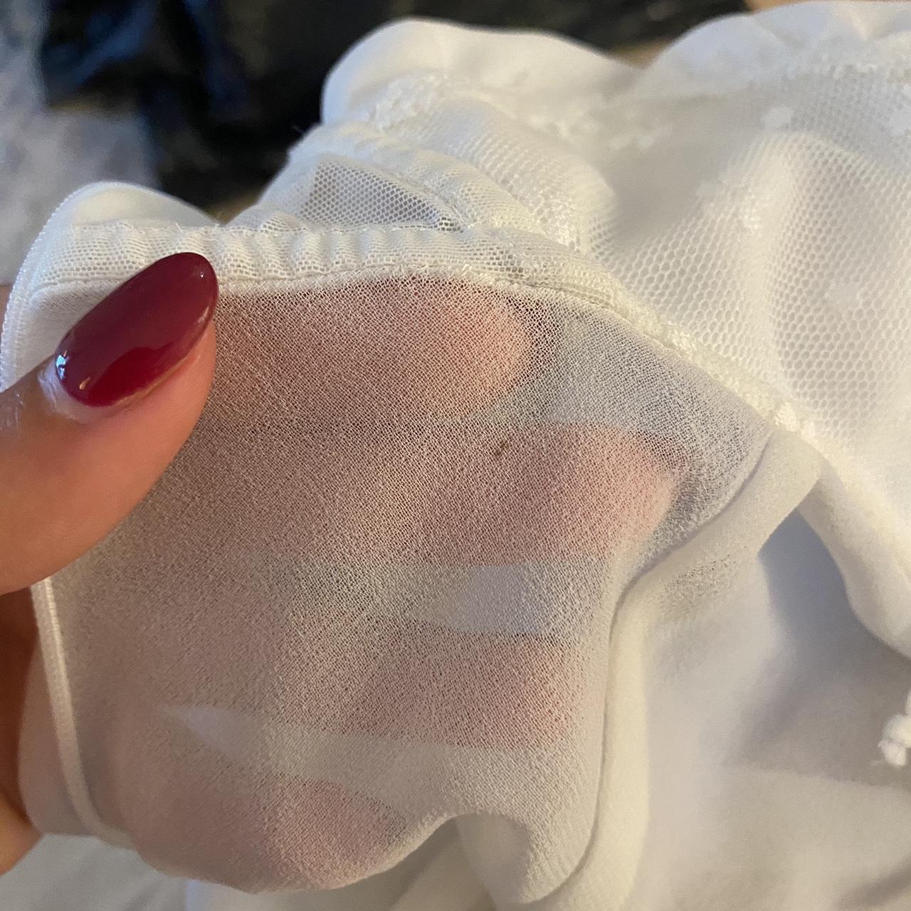 Unif angel tank Super cute but small dot on the mesh... - Depop