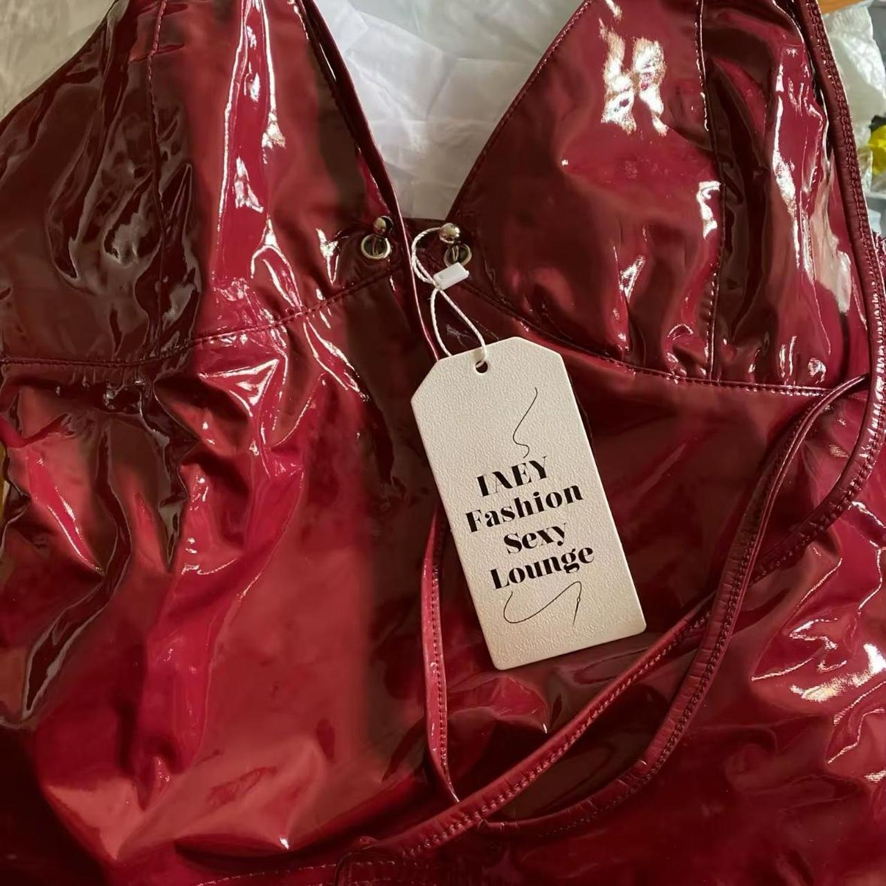 Red vinyl top with zipper detail #ravevibes #y2kfashion | Depop