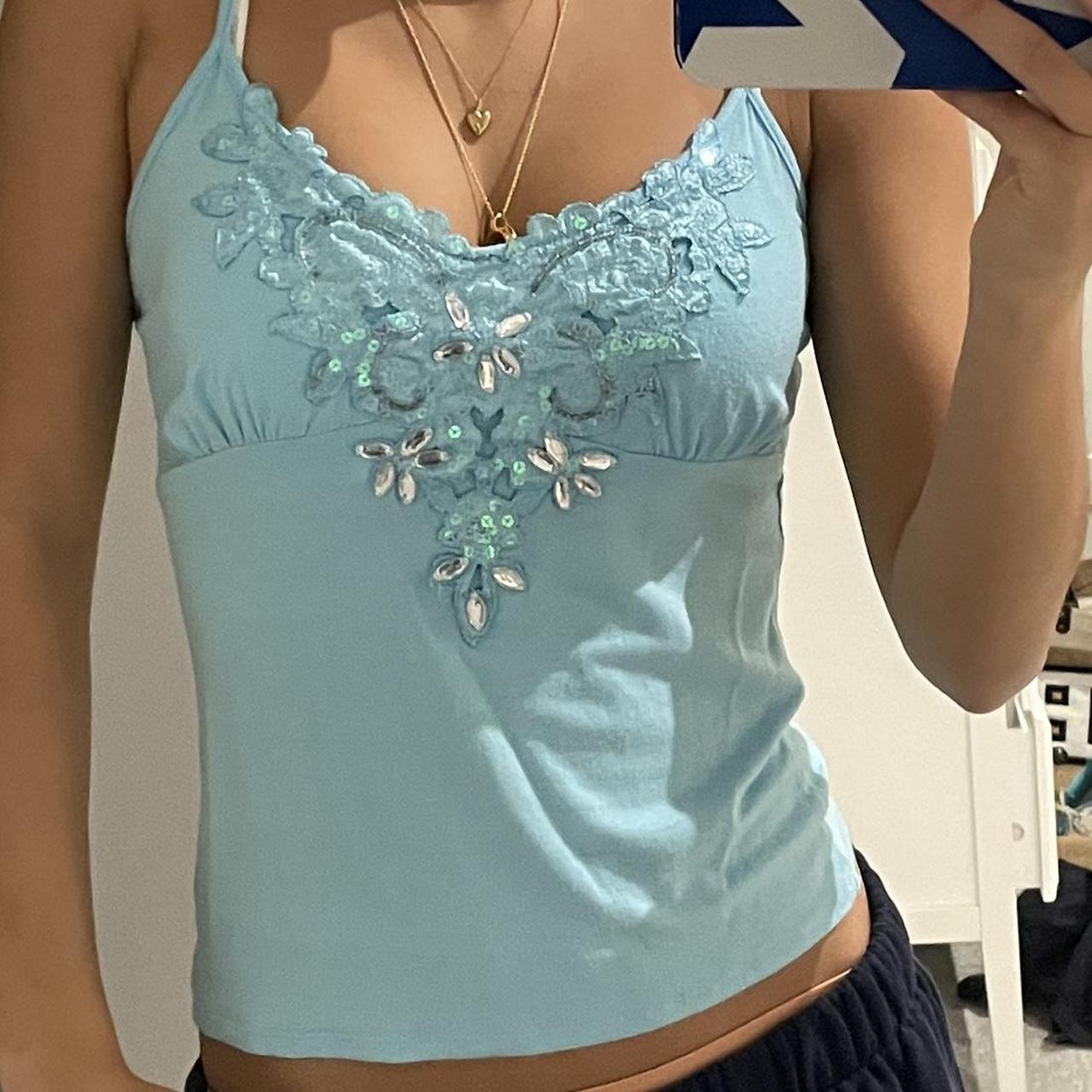 turqoise/light blue tank top embellished with... - Depop