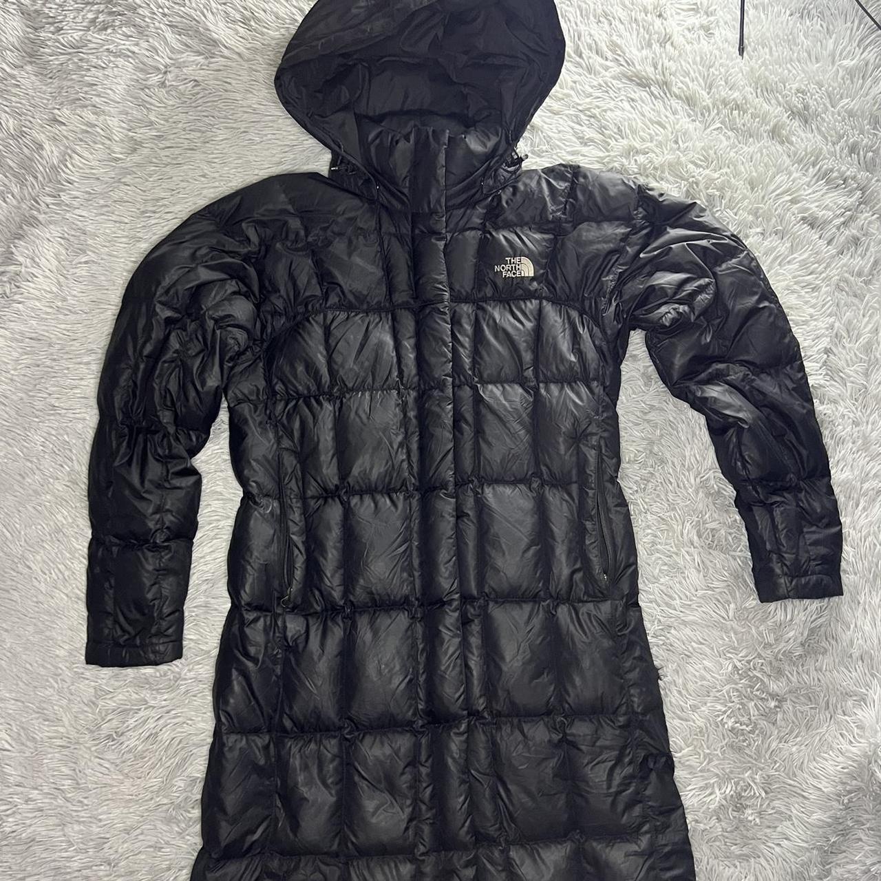 Womens long puffer North Face jacket Small tear... - Depop