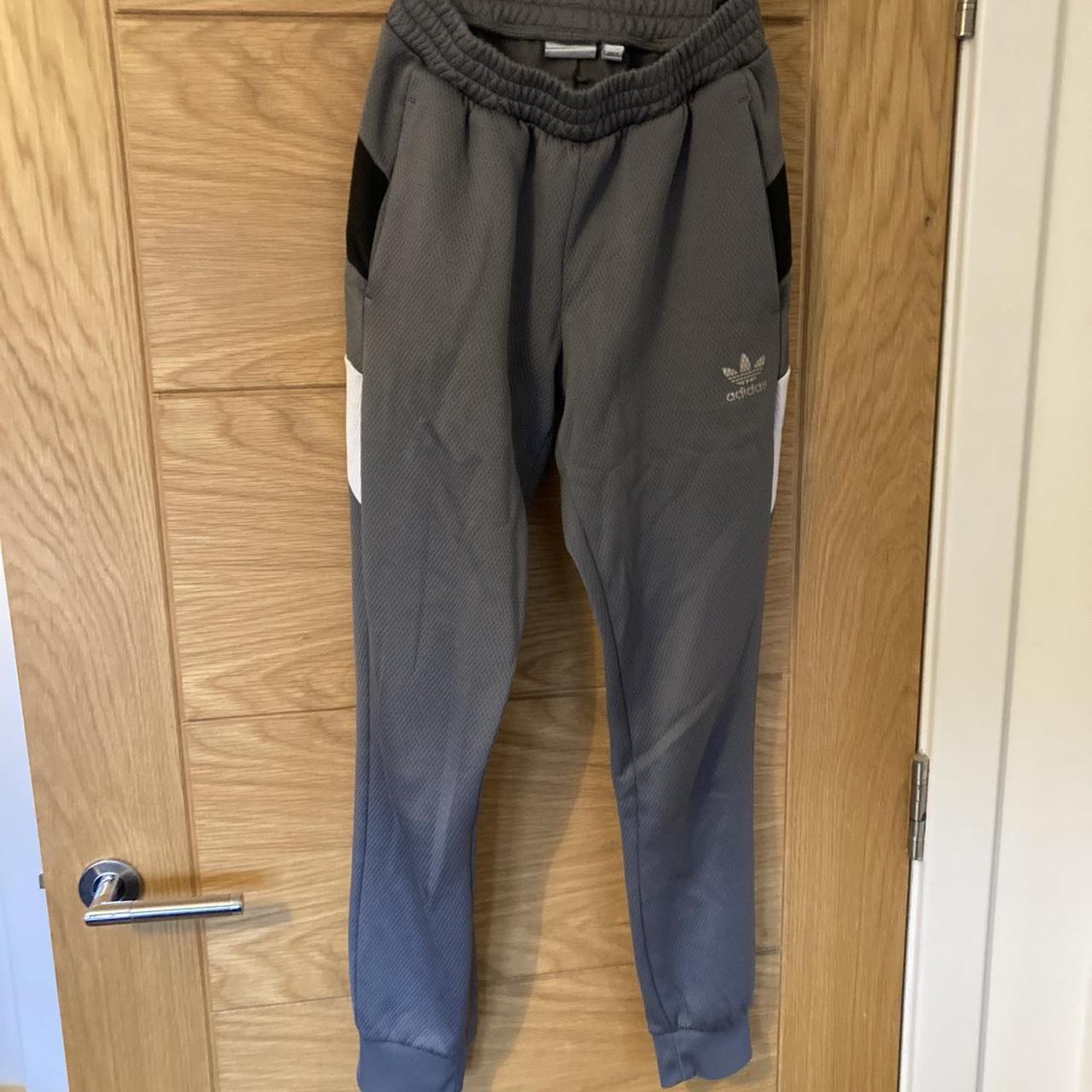 Grey black and white adidas joggers. Size xs, fits... - Depop