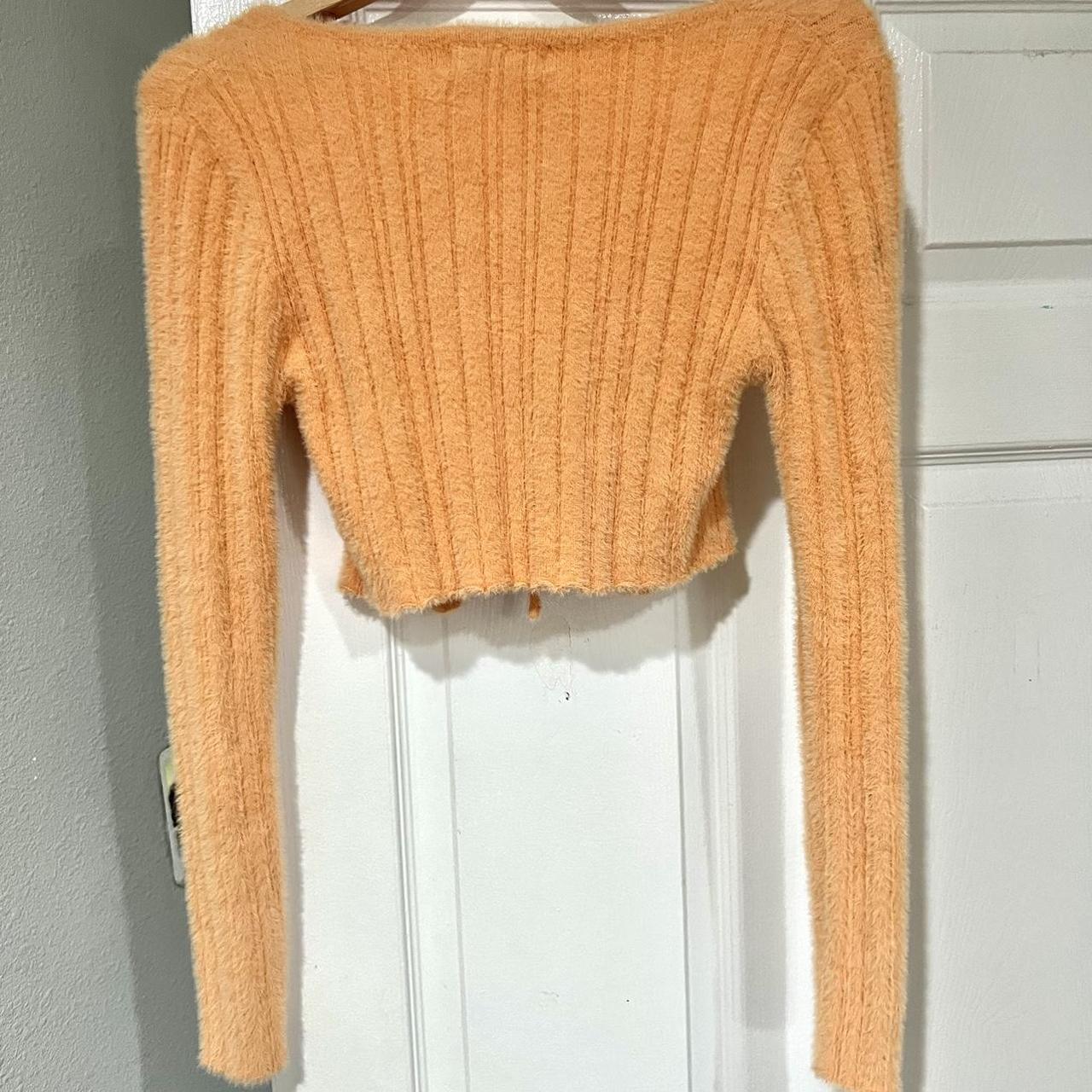 Orange cropped tie front fuzzy sweater. Only worn... - Depop