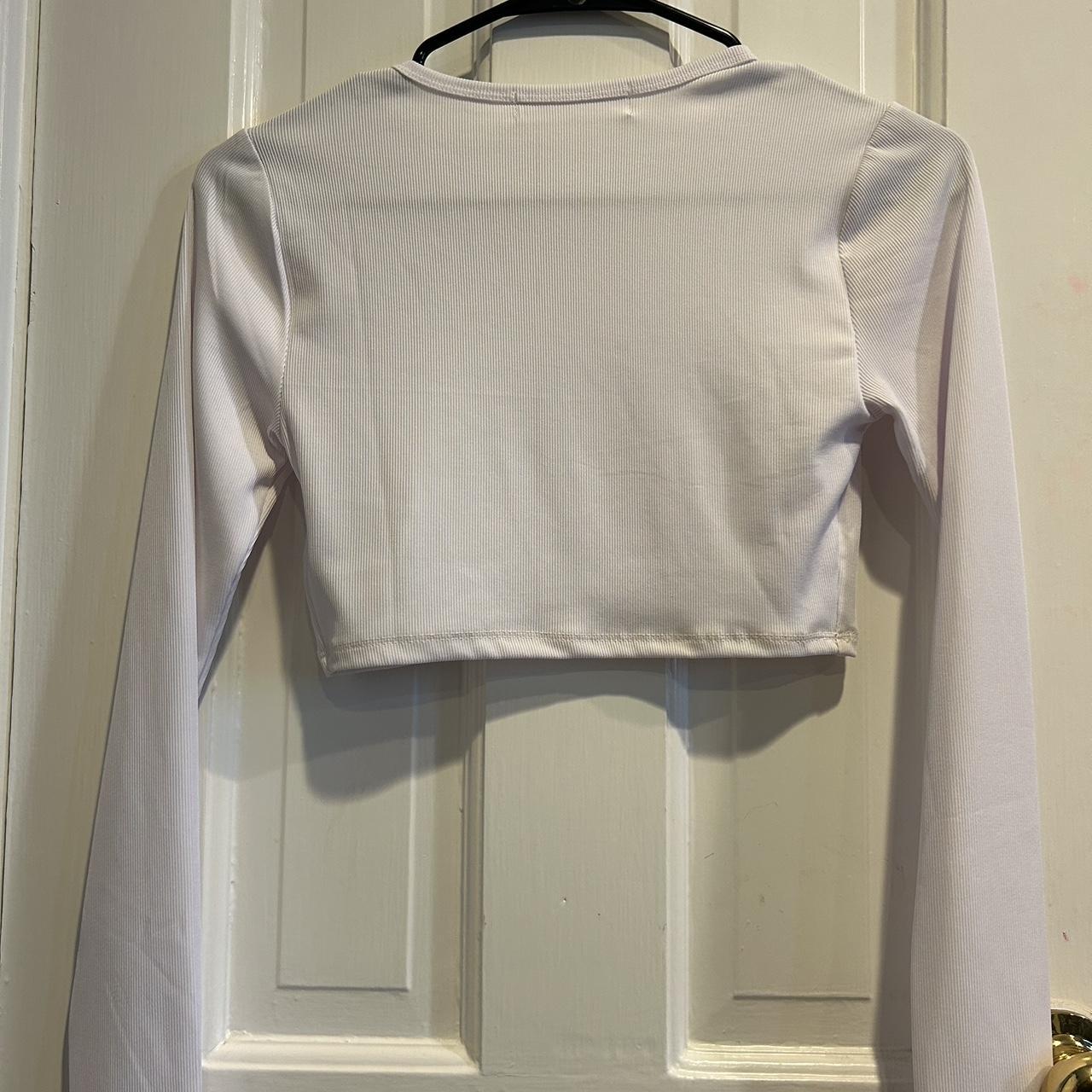 white cropped long sleeve top worn once, size extra... - Depop