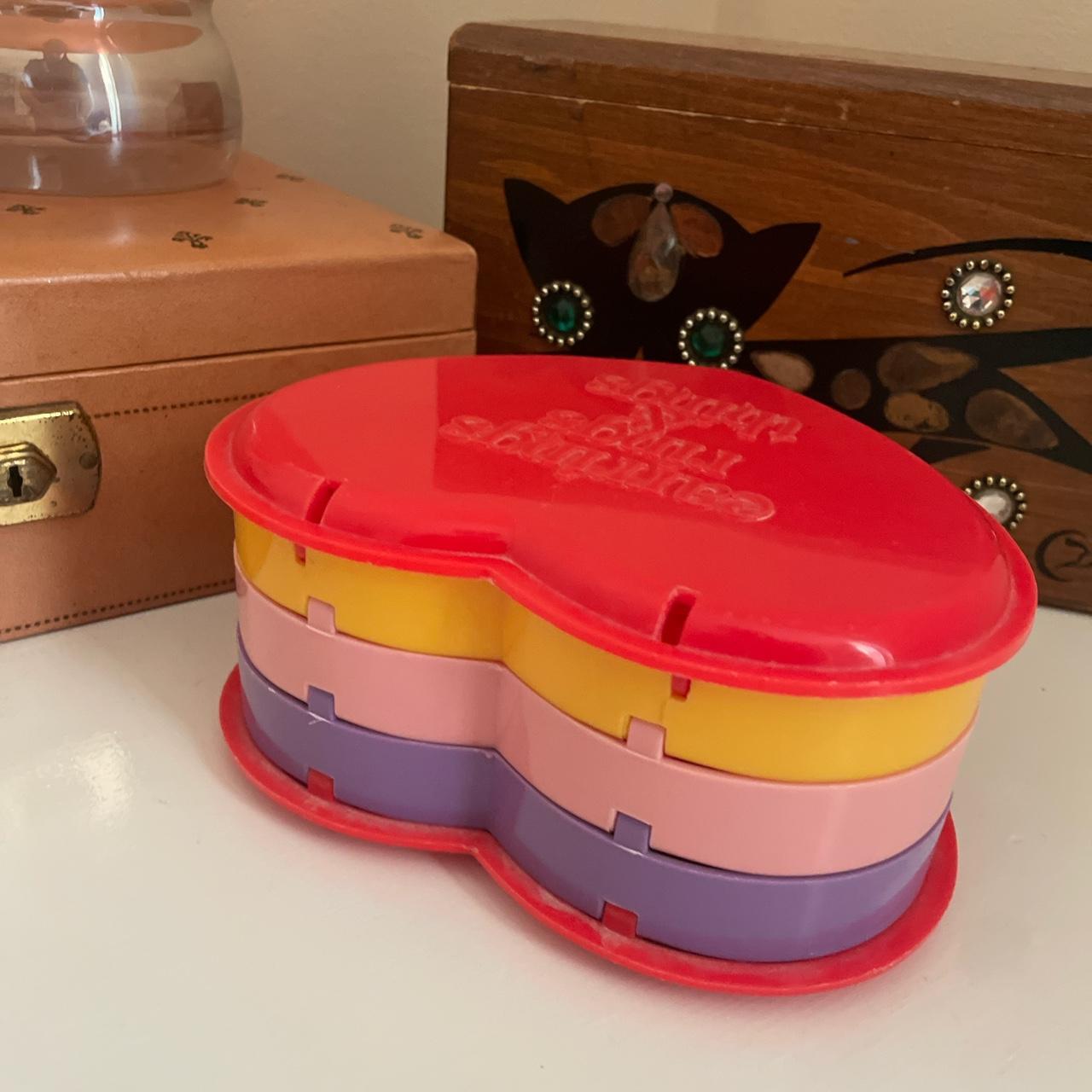 Cute heart-shaped plastic container for jewelry... | Depop