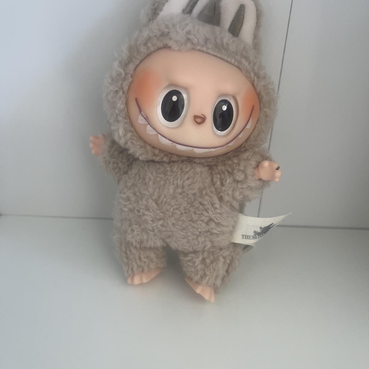 Beige Labubu This super cute doll is dressed in a... | Depop