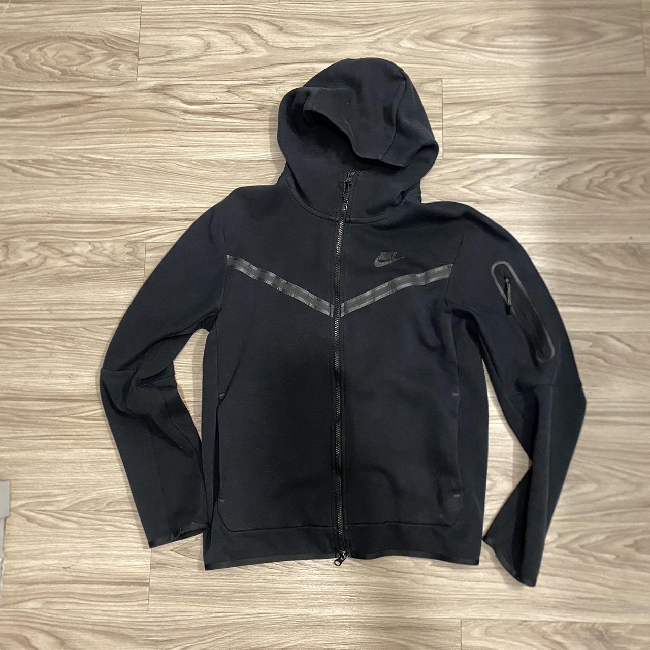 medium black Nike Tech Fleece jacket - Depop