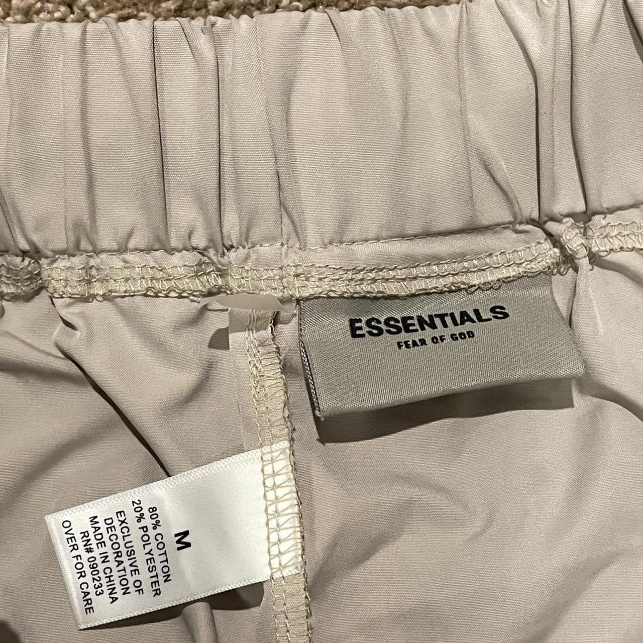 essentials tan track lounge pants || great condition... - Depop
