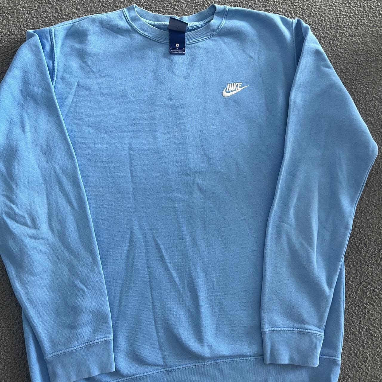 Blue Nike crewneck worn multiple small mark on... - Depop