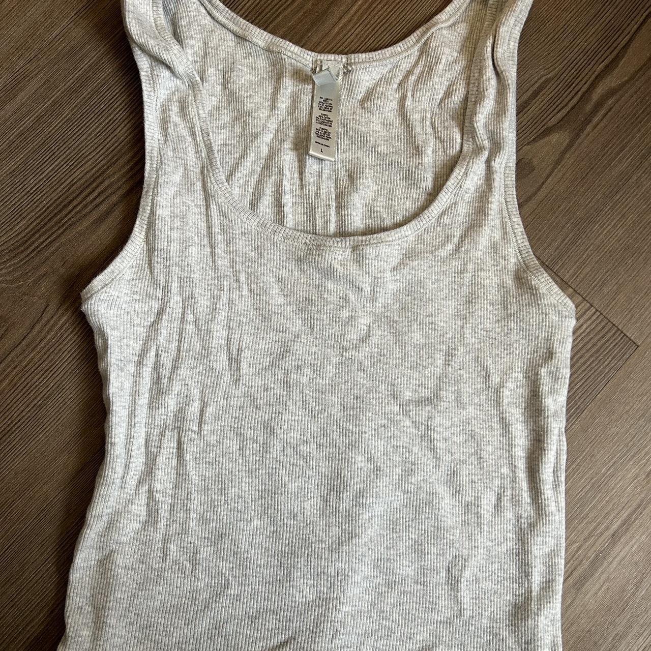 size large grey skims tank. - Depop