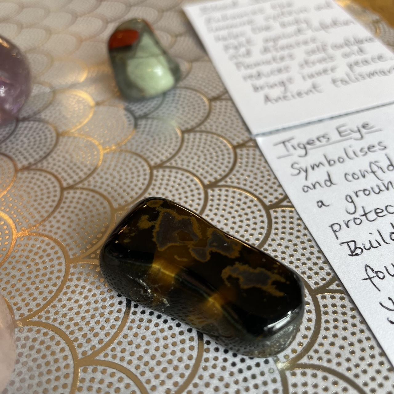 Four crystals: Tigers eye, Rose Quartz, Amethyst and... - Depop