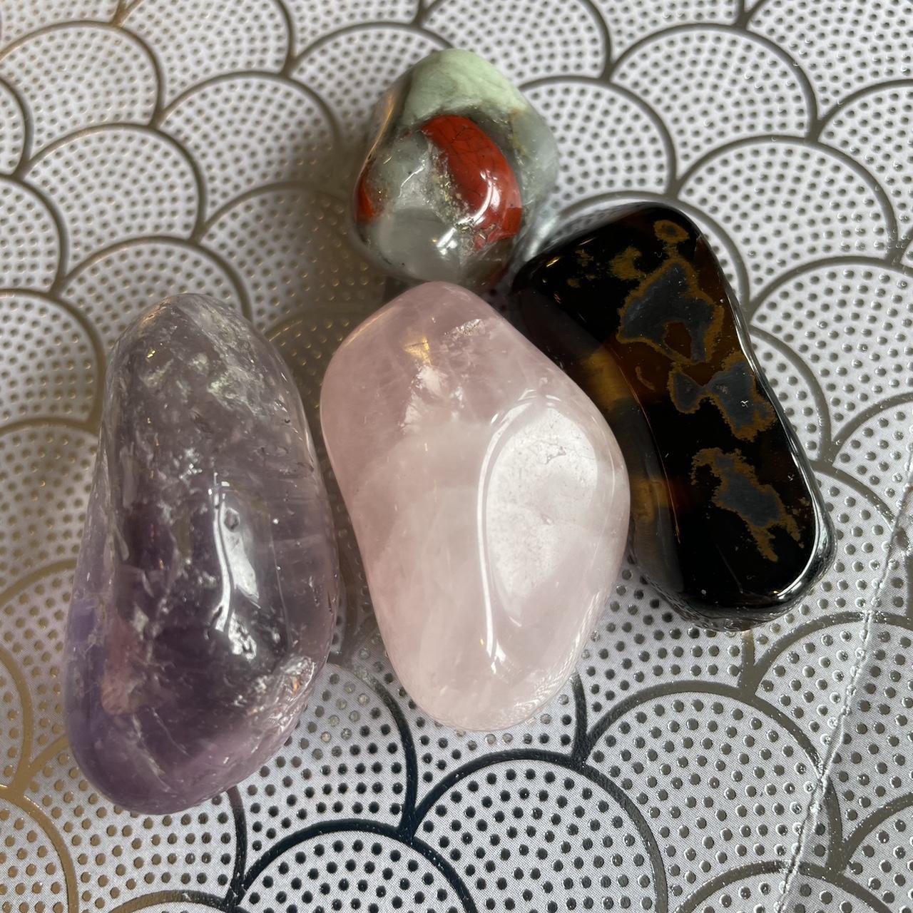 Four crystals: Tigers eye, Rose Quartz, Amethyst and... - Depop