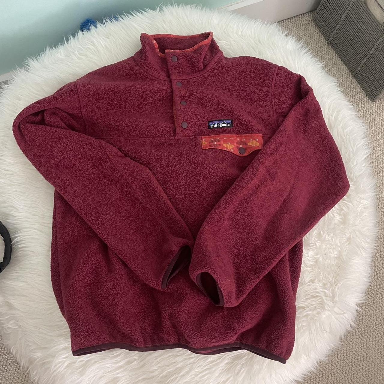 Patagonia maroon fleece with detail on front pocket.... - Depop