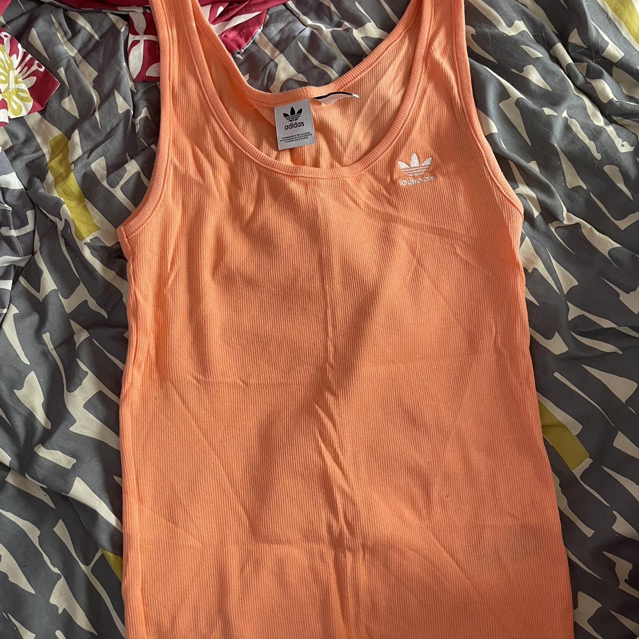 •bright orange adidas tank from urban... - Depop