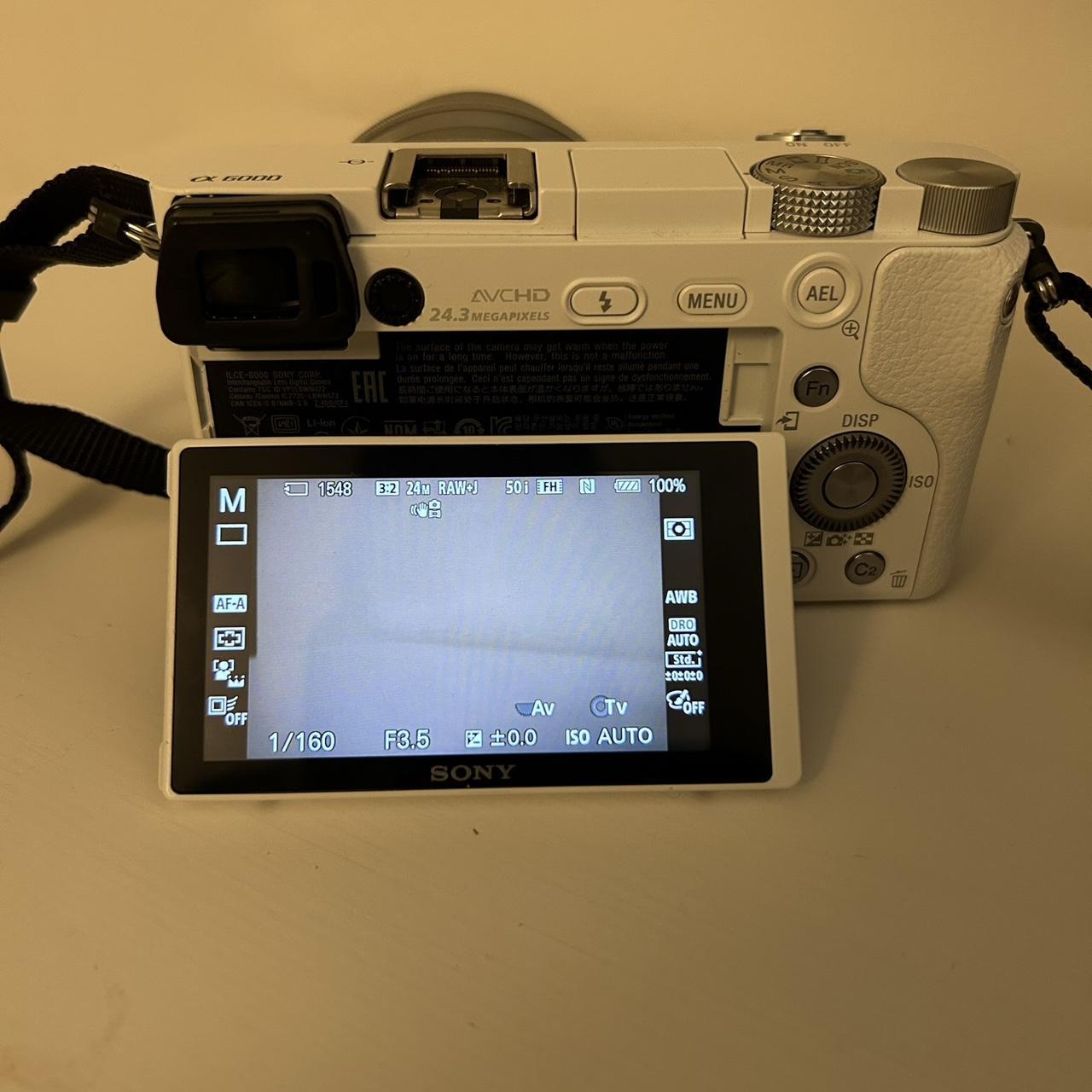White Sony Alpha A6000 24.3MP Mirrorless Camera... - Depop