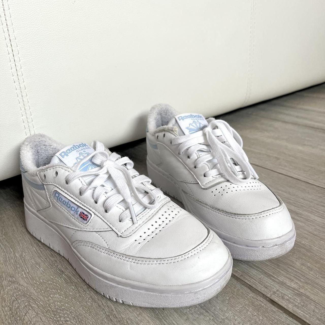 Reebok blue and white sneakers worn a few times... - Depop