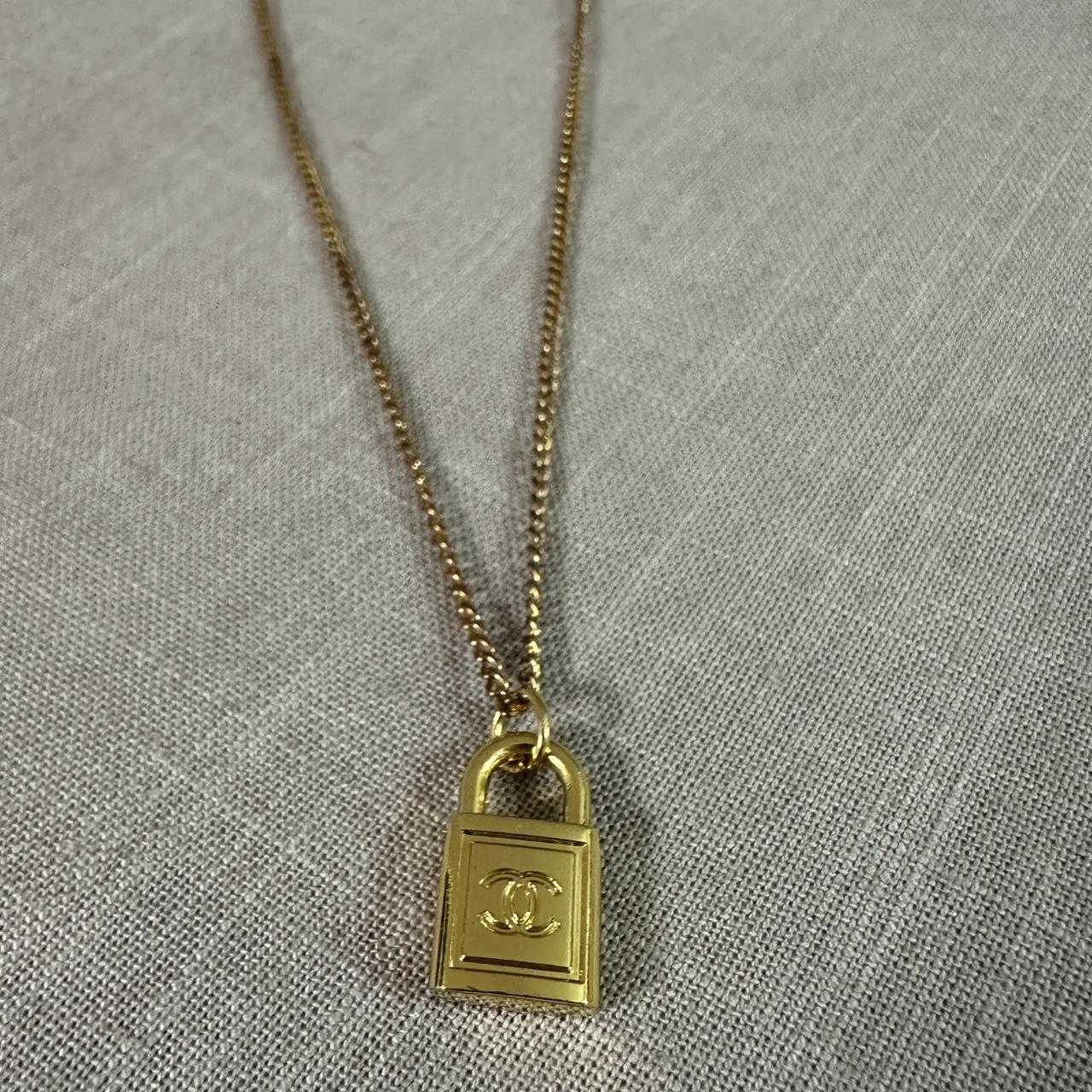 Chanel lock necklace #chanel #vintage... - Depop