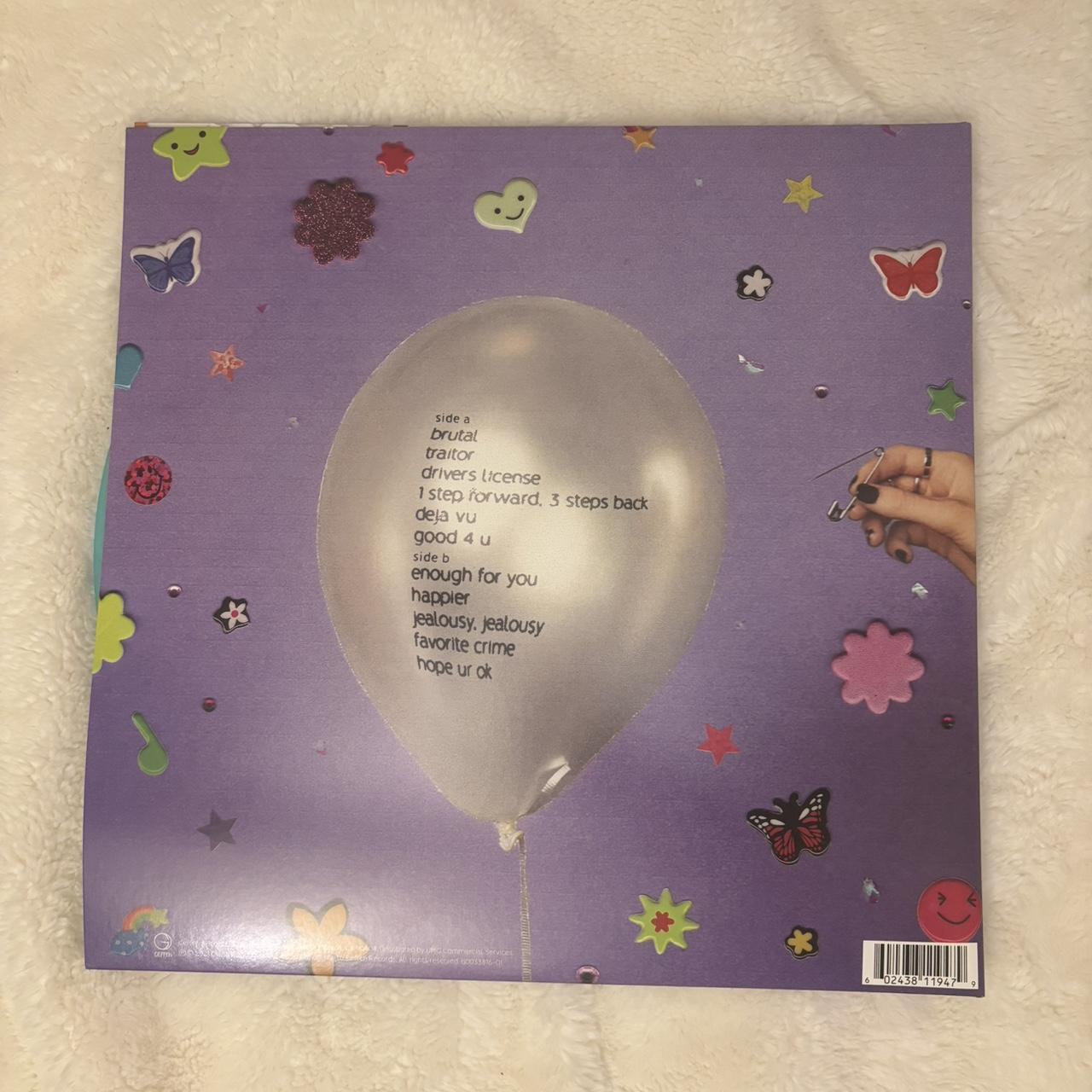 olivia rodrigo sour vinyl played a couple times,... - Depop