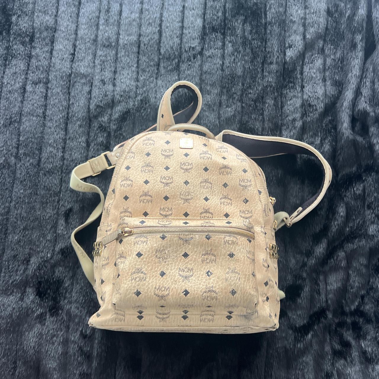 A VERY USED BUT BEAUTIFUL AND DURABLE M.C.M. CREAM... - Depop