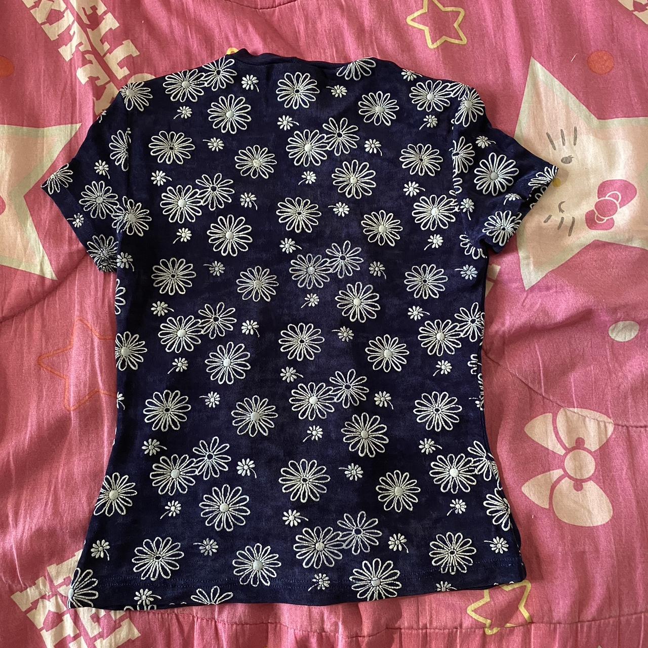 Vintage Blue Daisy Tee Size L but best fits a size... - Depop