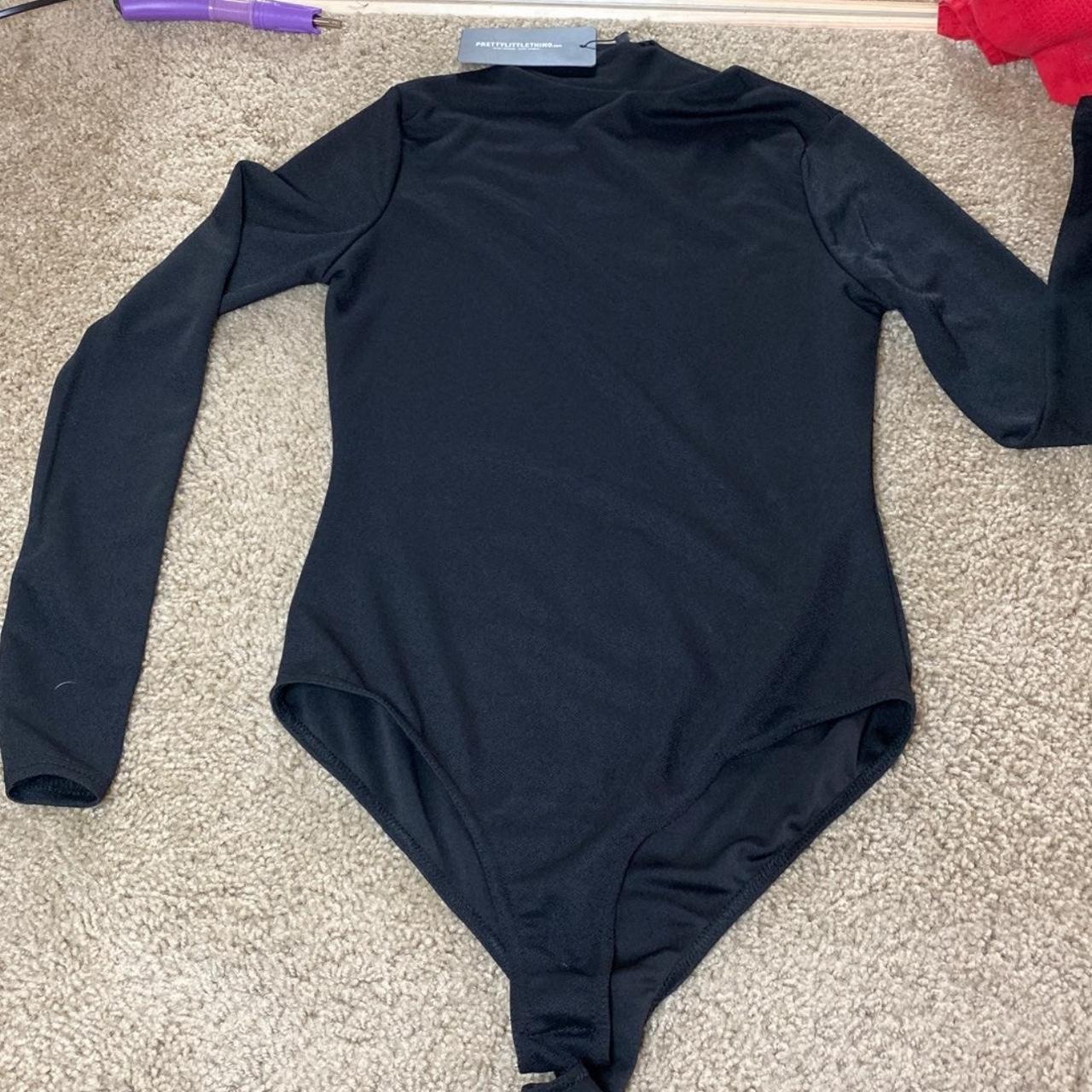 Black turtle neck body suit. Has buttons at the... - Depop