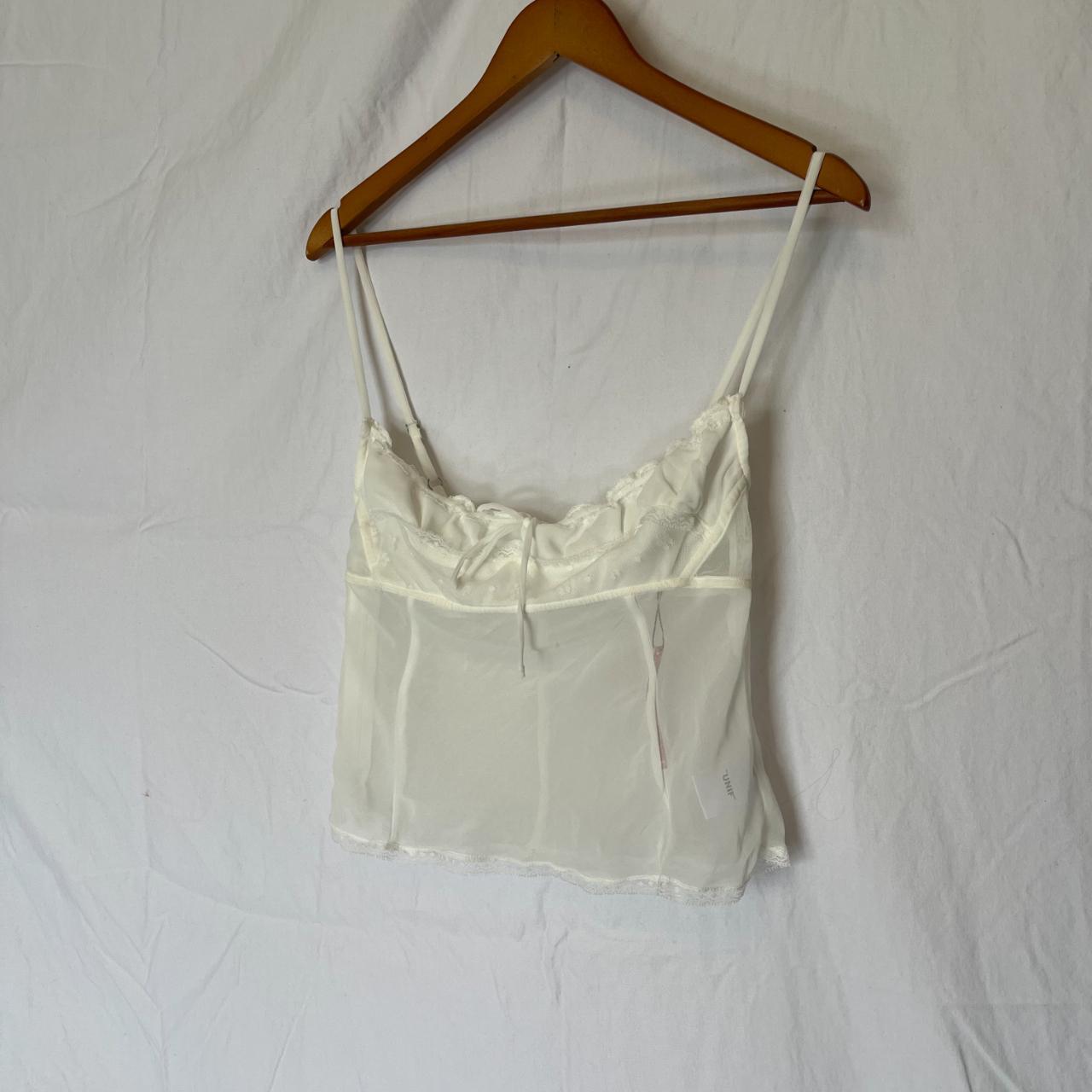 UNIF Women's White Vest | Depop