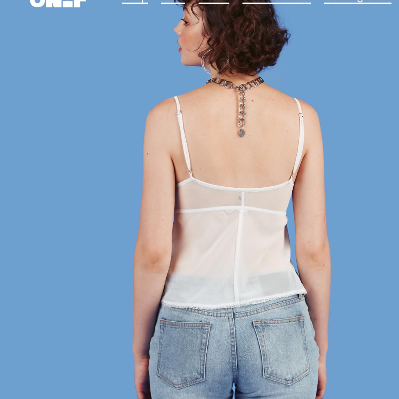 UNIF Women's White Vest | Depop