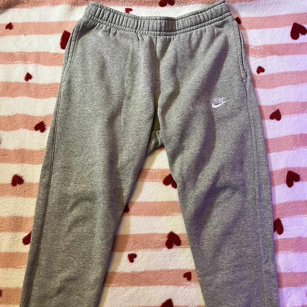 Cute grey Nike sweatpants! Little hole by front... - Depop
