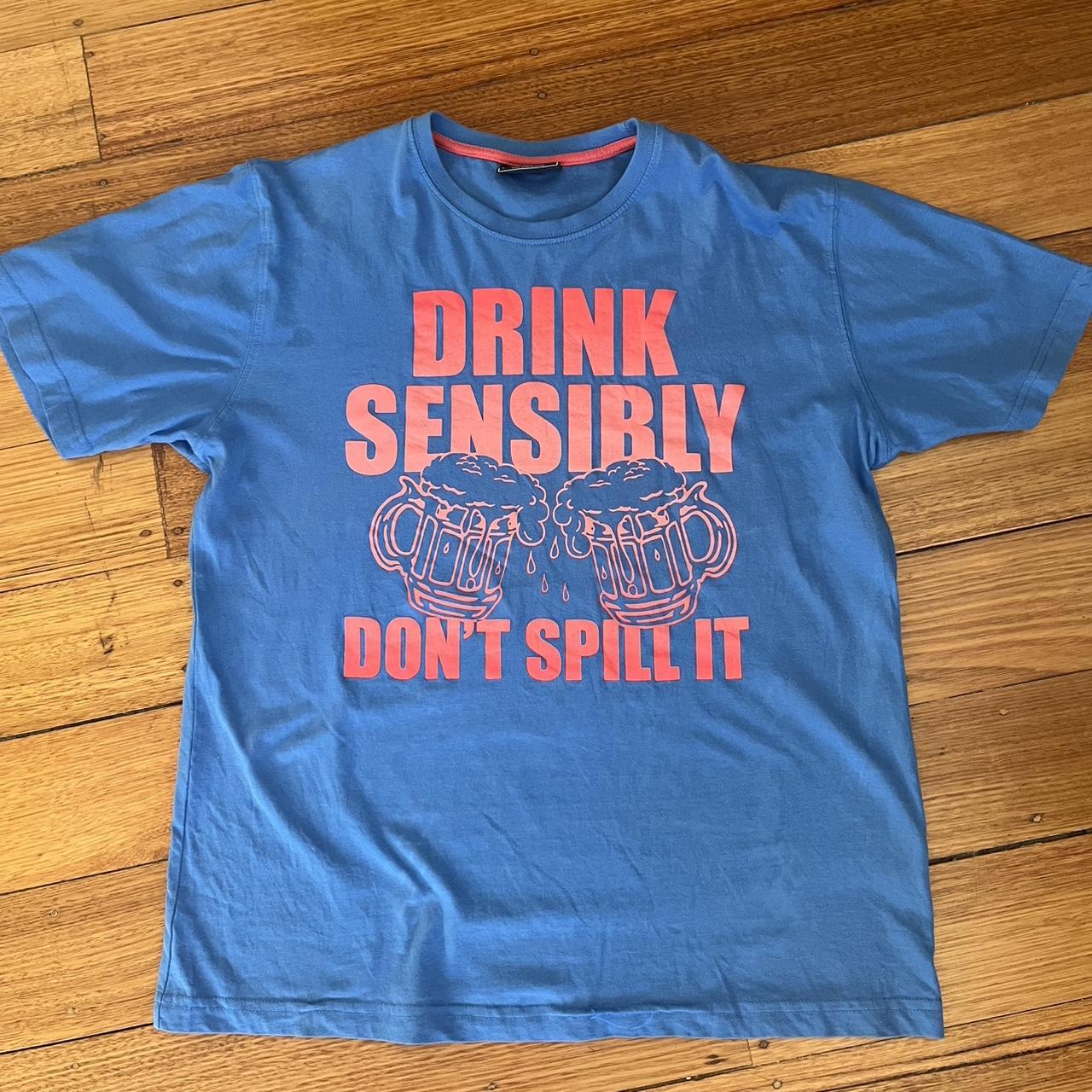 ‘Drink Sensibly Don’t Spill It’ blue and orange... | Depop