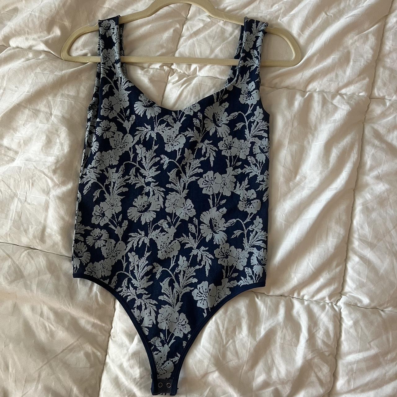 Free People dark & light blue floral printed bodysuit - Depop