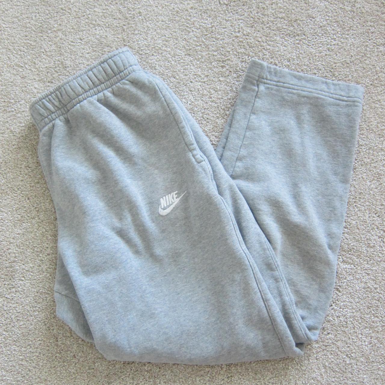 grey nike sweatpants woman's large (baggy on a... - Depop